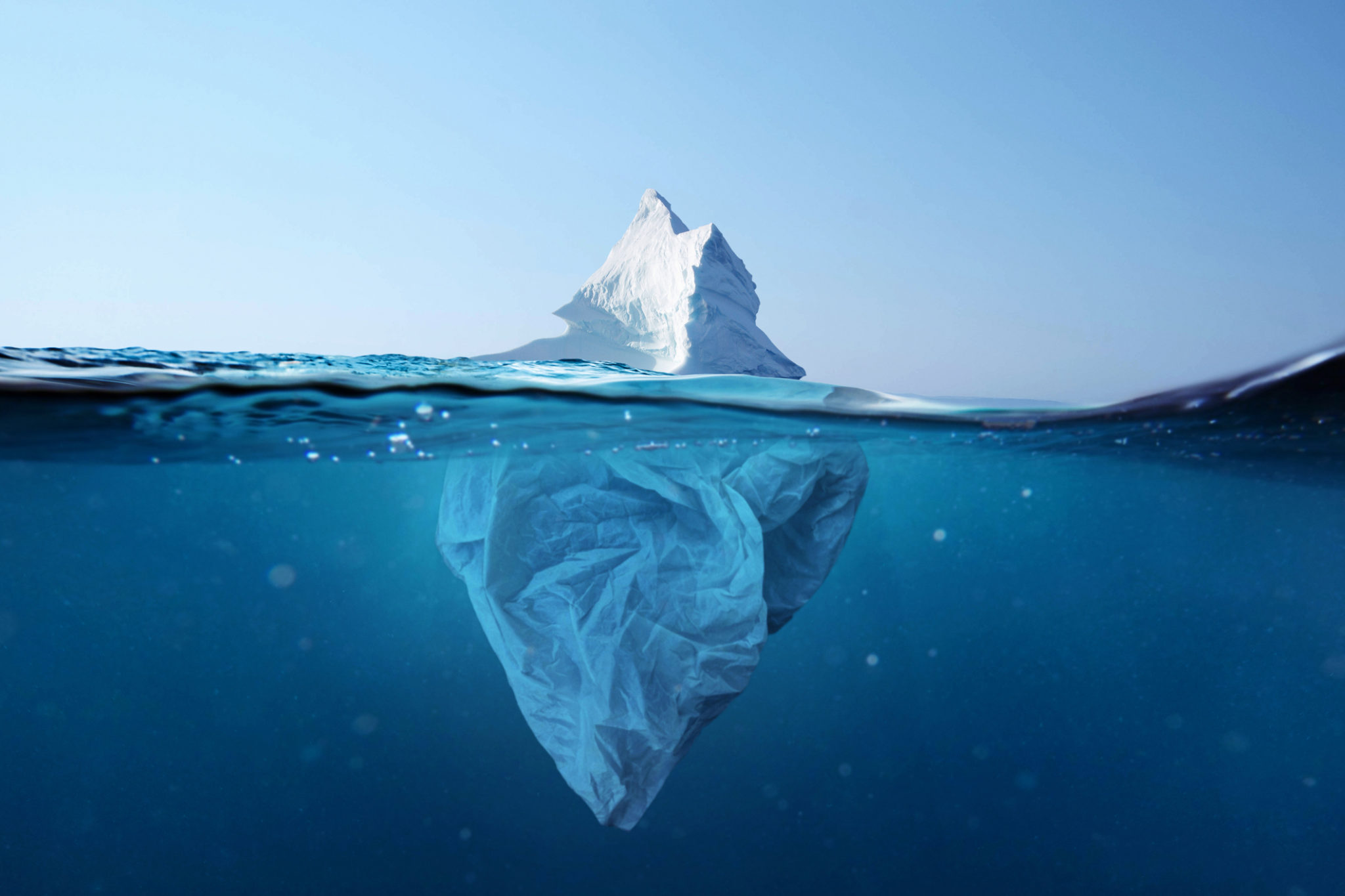 Iceberg – plastic bag with a view under the water. Pollution of the ...
